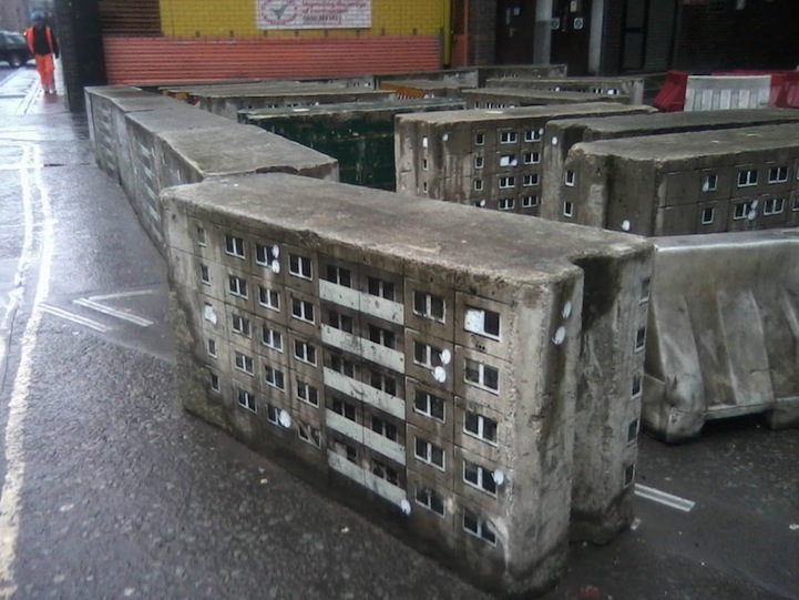 This street artist turns urban infrastructure into miniature apartment ...