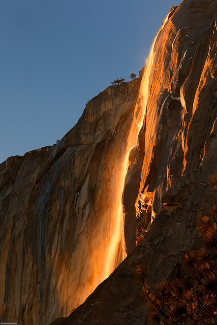 Once a year, this waterfall looks like a stream of falling lava | Grist