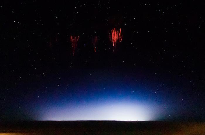 These photos of red lightning are unsettling yet cool | Grist