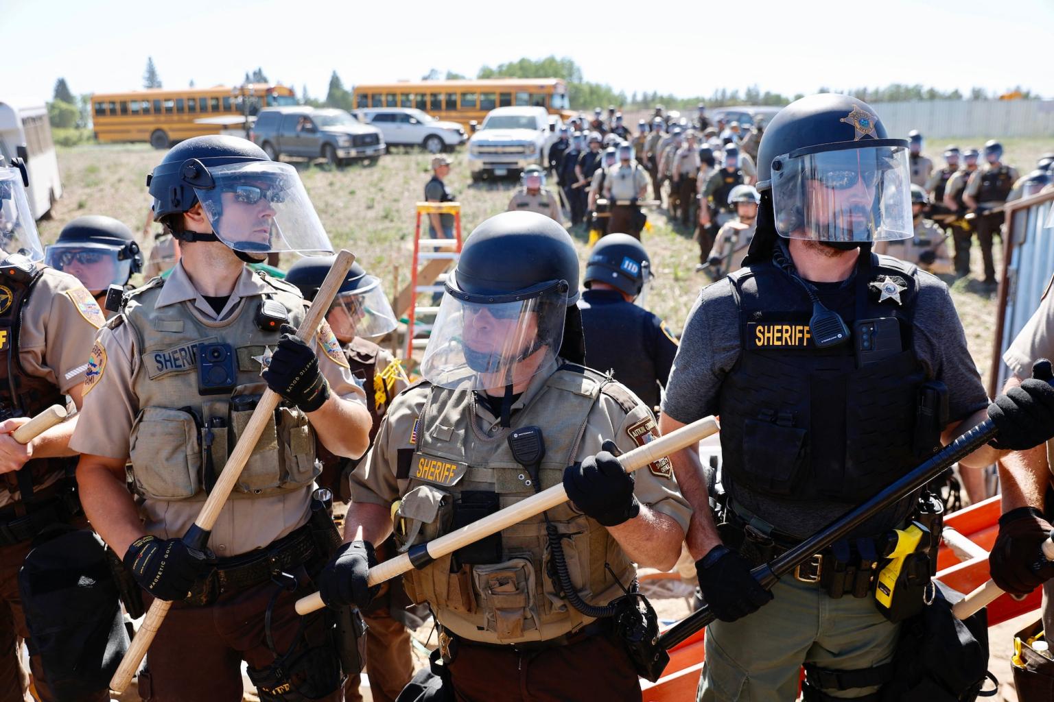 Enbridge paid police to protect one pipeline. Now it wants to do it ...